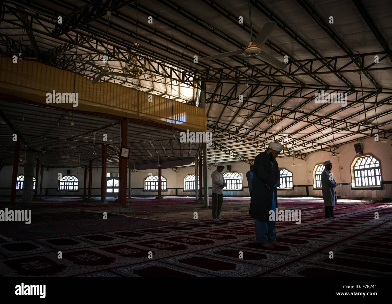 Iranian Shiite Muslim Prayers In A Huge Empty Mosque, Golestan Province ...