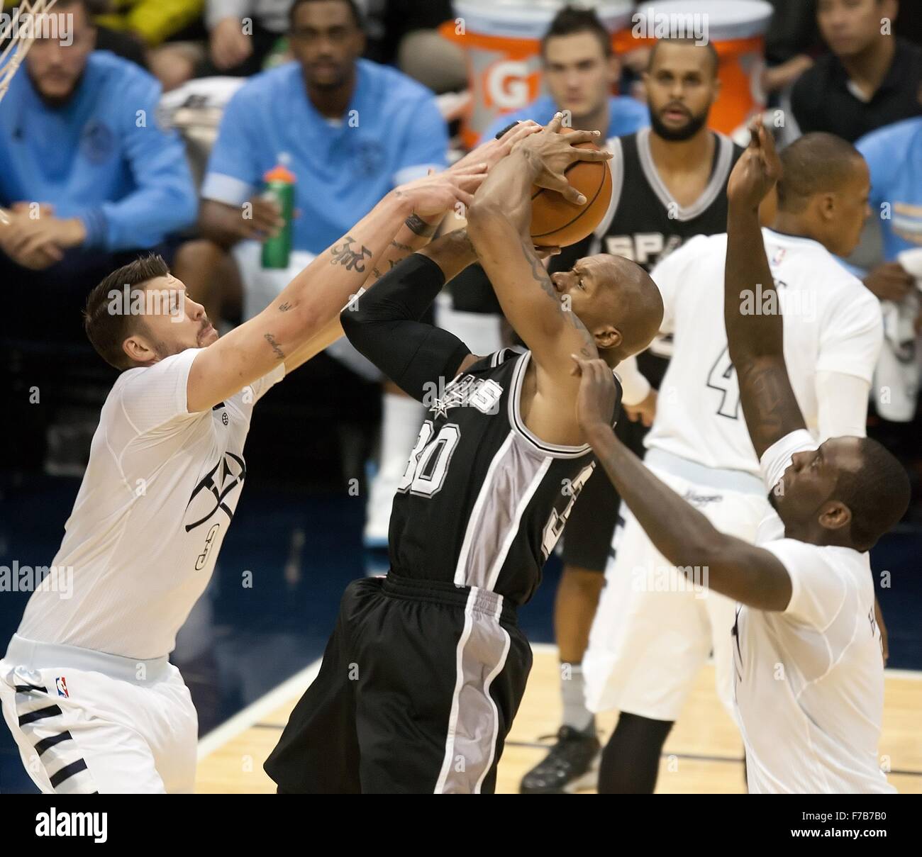 Denver, Colorado, USA. 27th Nov, 2015. Nuggets MIKE MILLER, left ...