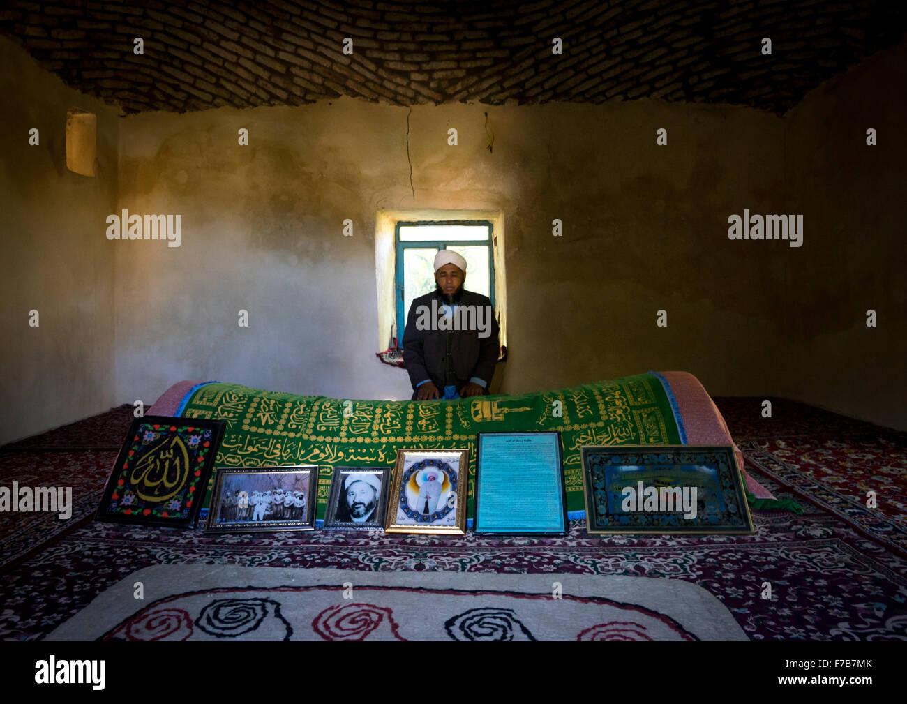 Iranian Shiite Iman Praying Inside A Shrine In Front Of A Tomb ...