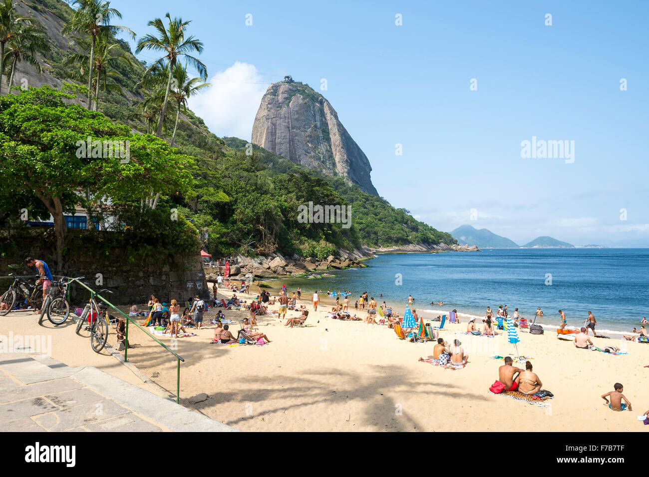 RIO DE JANEIRO, BRAZIL - OCTOBER 20, 2015: Beachgoers relax on Praia ...