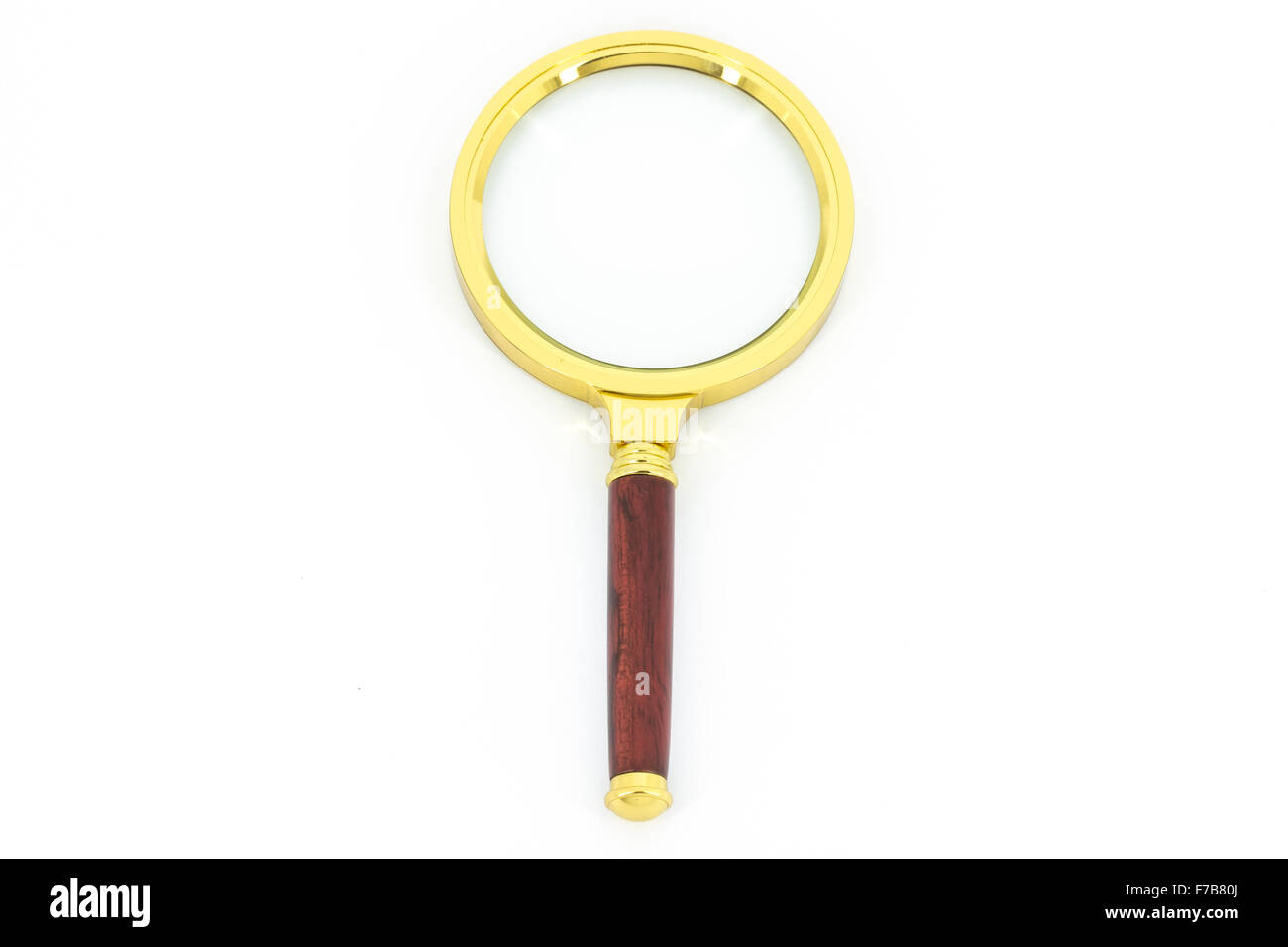 Magnifying glass golden gold hi-res stock photography and images - Alamy