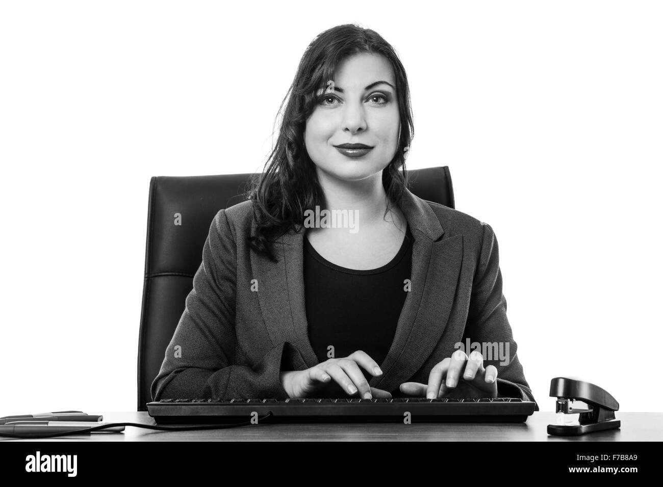 Working at desk Black and White Stock Photos & Images - Alamy
