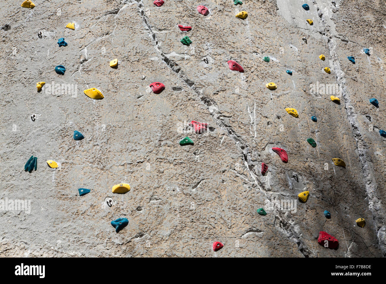 climbing wall with climbing holds for different climbing routes Stock ...