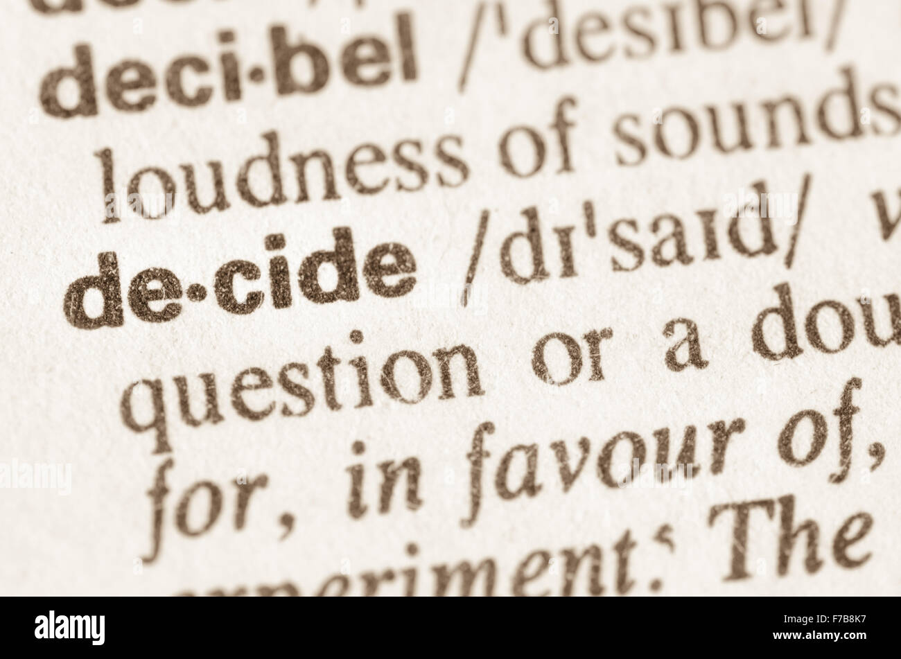 Definition of word decide in dictionary Stock Photo - Alamy