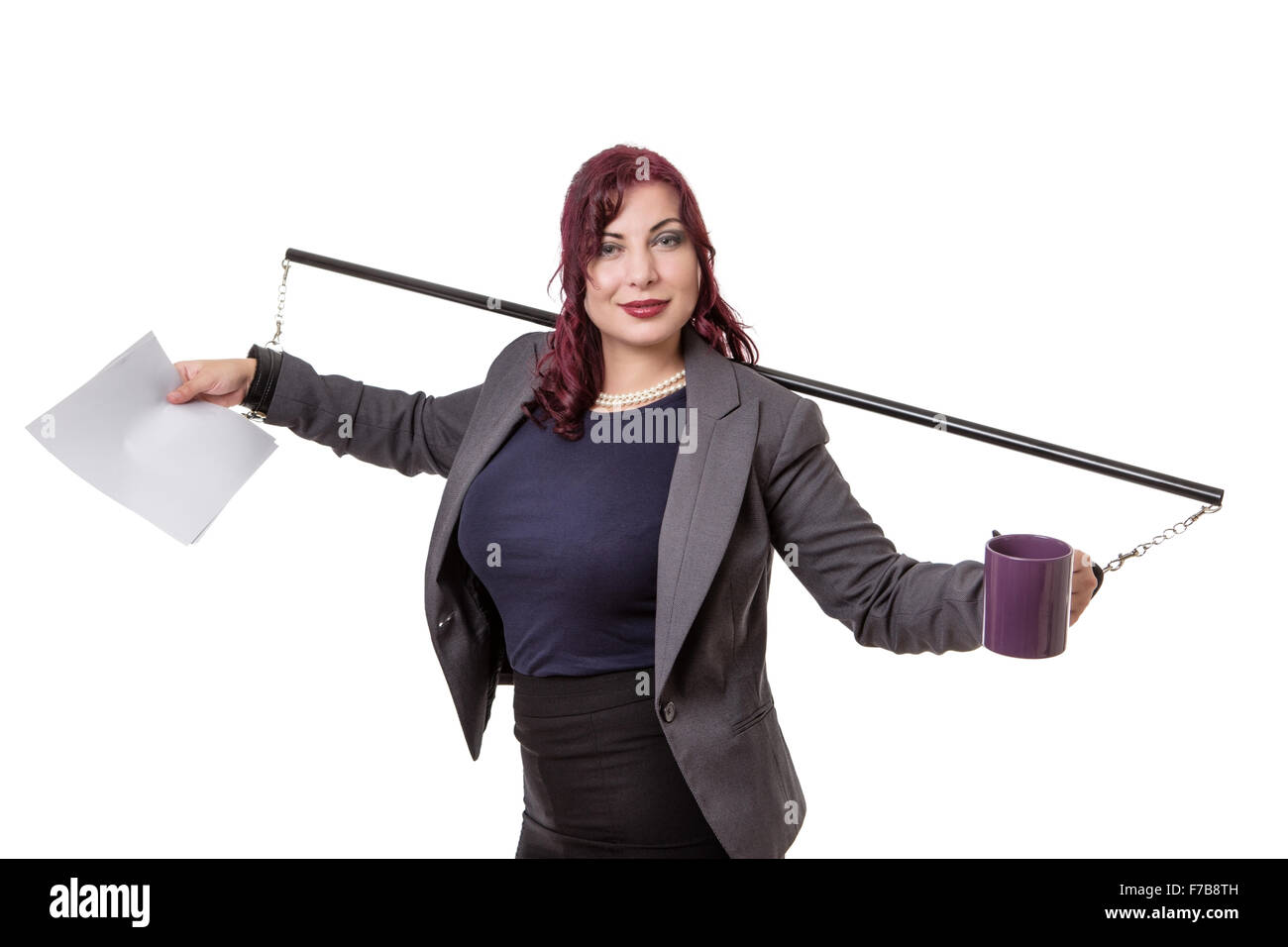 Business Woman with hands out to the side handcuffed to a pole, also ...