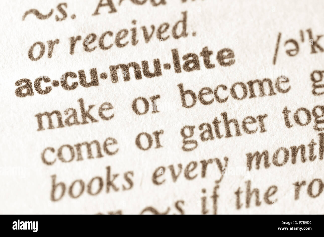 Definition of word accumulate in dictionary Stock Photo - Alamy