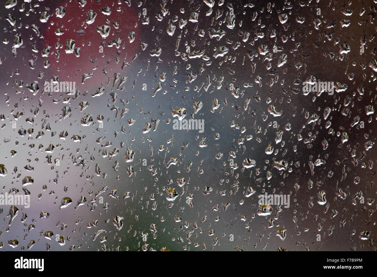 Raindrops on the surface of the dusty window Stock Photo - Alamy