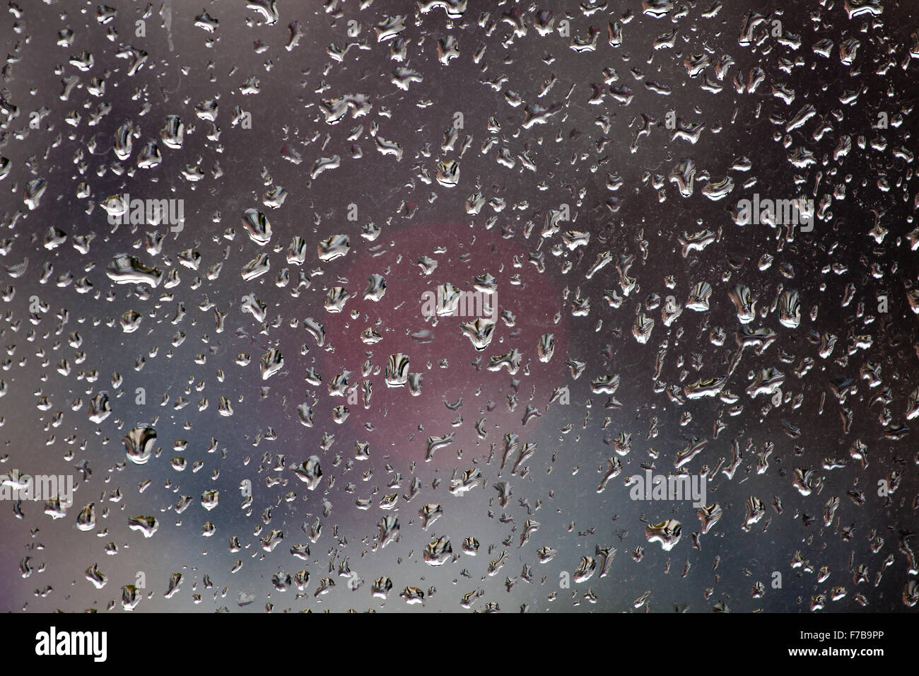 Raindrops on the surface of the dusty window Stock Photo - Alamy