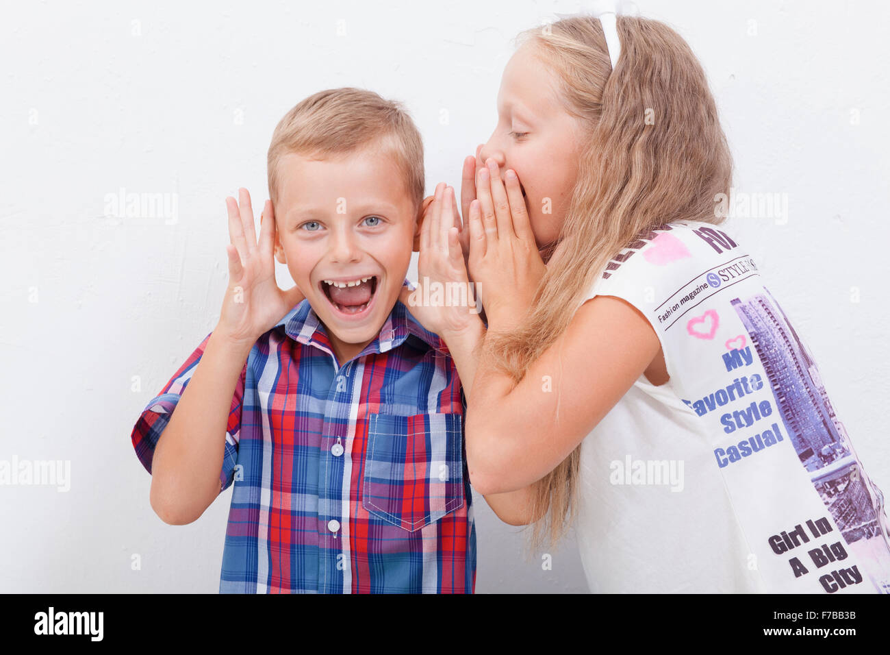 Kids Whispering A Secret