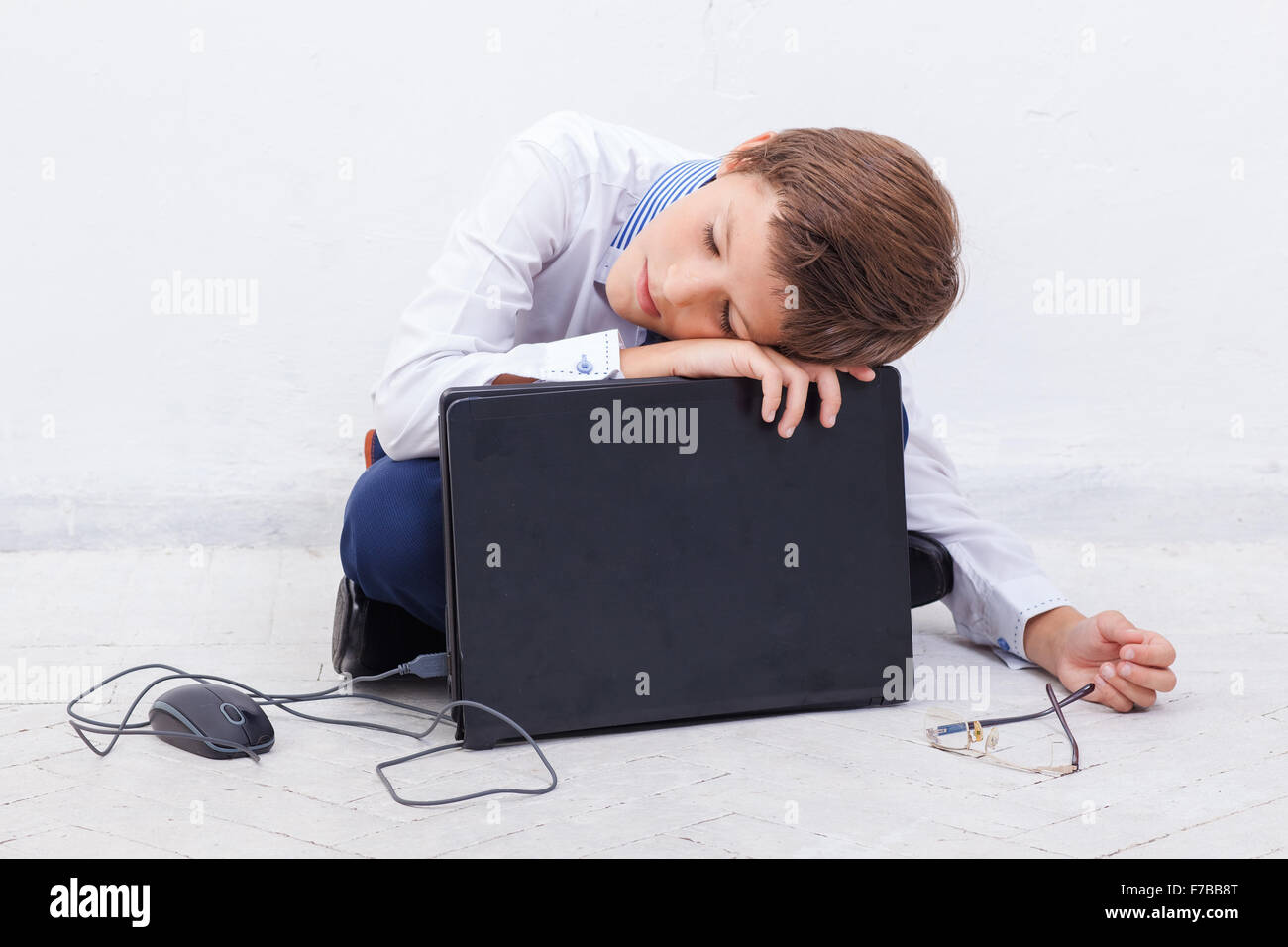 Boy using his laptop computer Stock Photo - Alamy