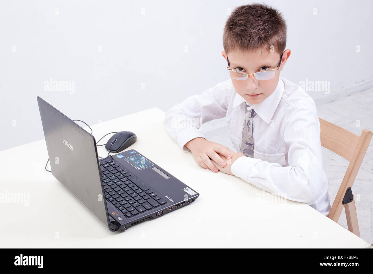 Boy using his laptop computer Stock Photo - Alamy