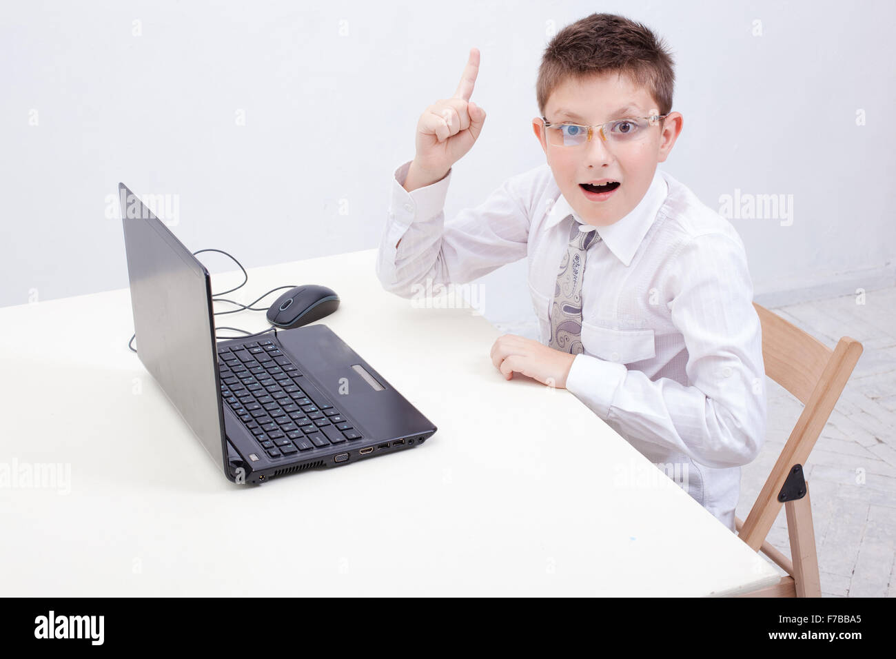 Boy using his laptop computer Stock Photo - Alamy