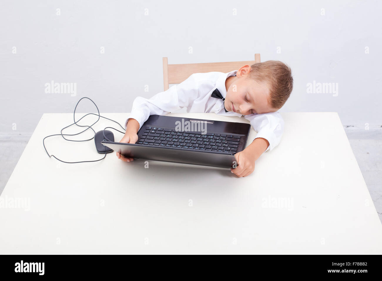 Boy using his laptop computer Stock Photo - Alamy