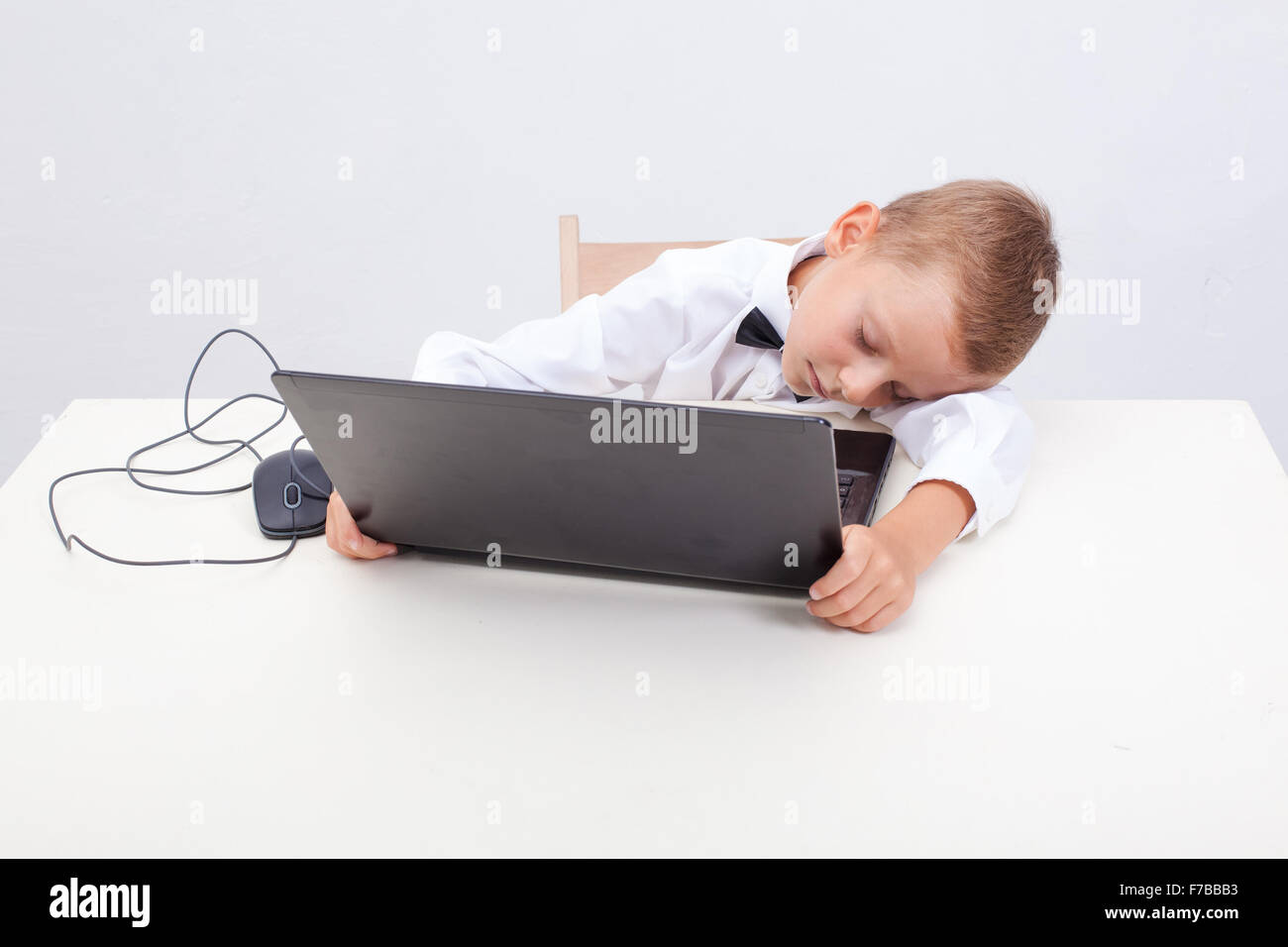 Boy using his laptop computer Stock Photo - Alamy