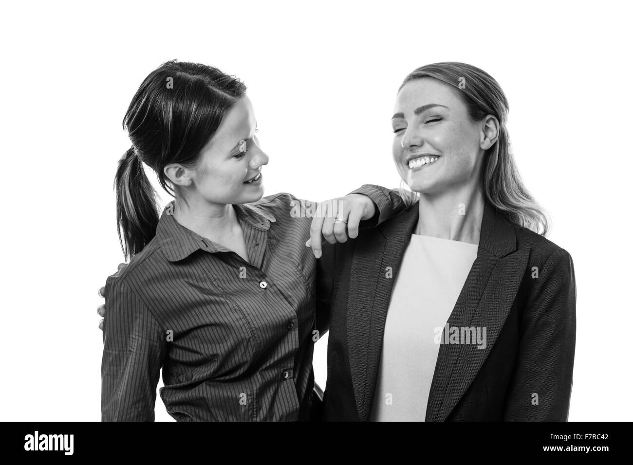 two very friendly business woman Stock Photo - Alamy