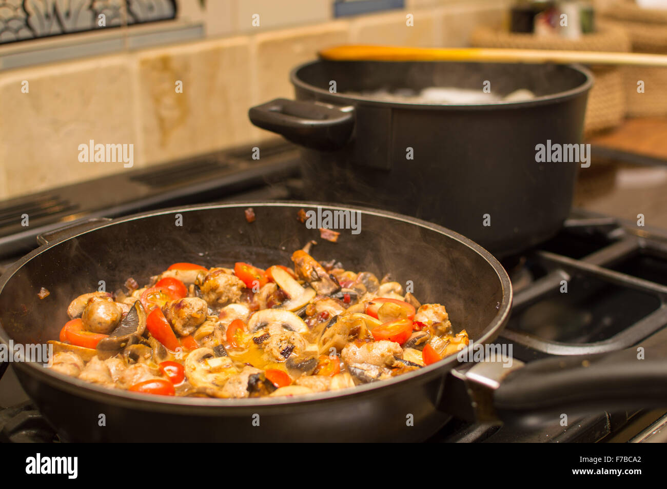 Cooking home stove hi-res stock photography and images - Alamy