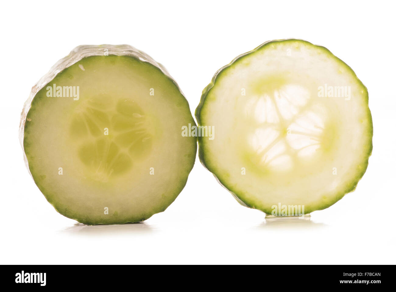 two slices of cucumber cutout Stock Photo - Alamy