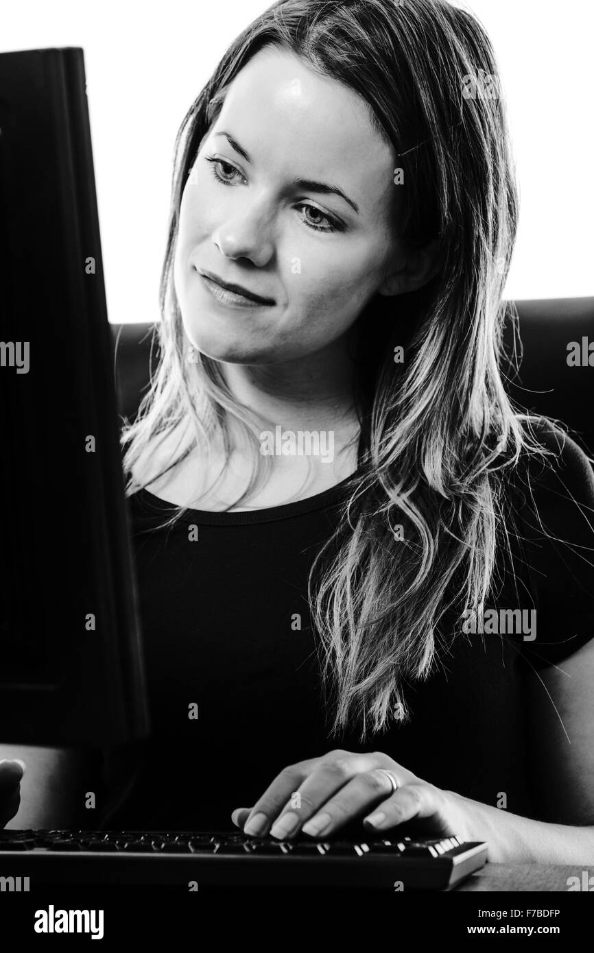 Person working at computer at home Black and White Stock Photos ...