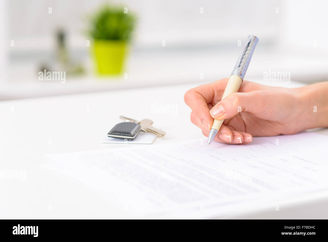 Hotel form and room keys resting on the counter Stock Photo - Alamy