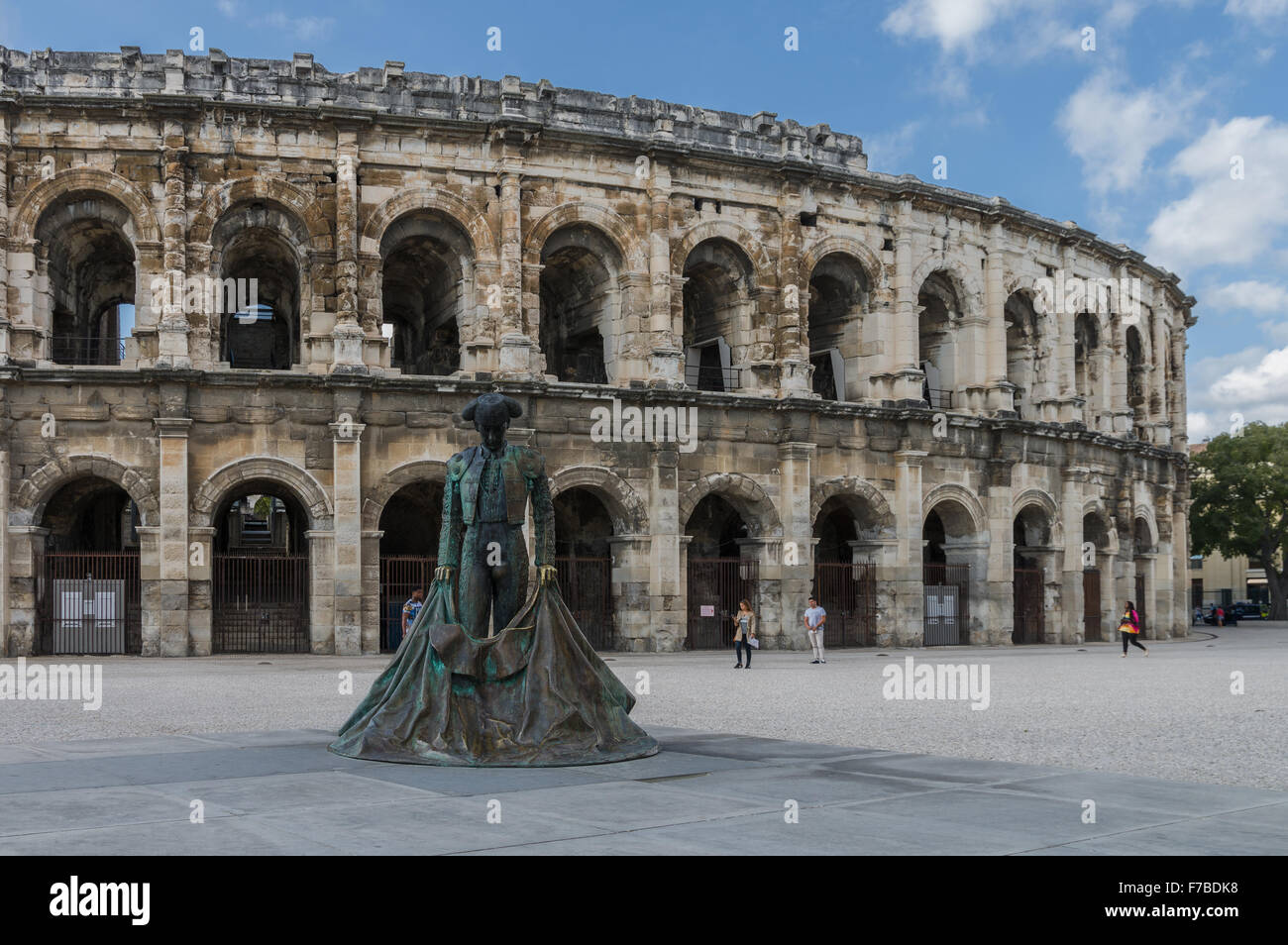 Roman Arena (Amphitheater) in Arles and bullfighter sculpture, Provence ...
