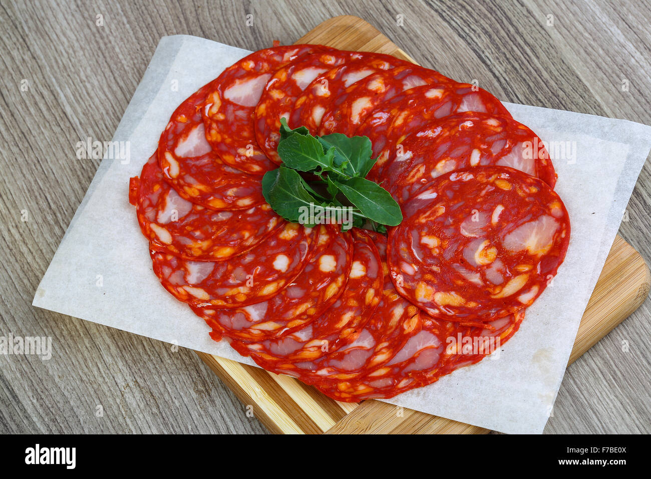 Traditional Spanish salami - Chorizo sausage on the wood background ...