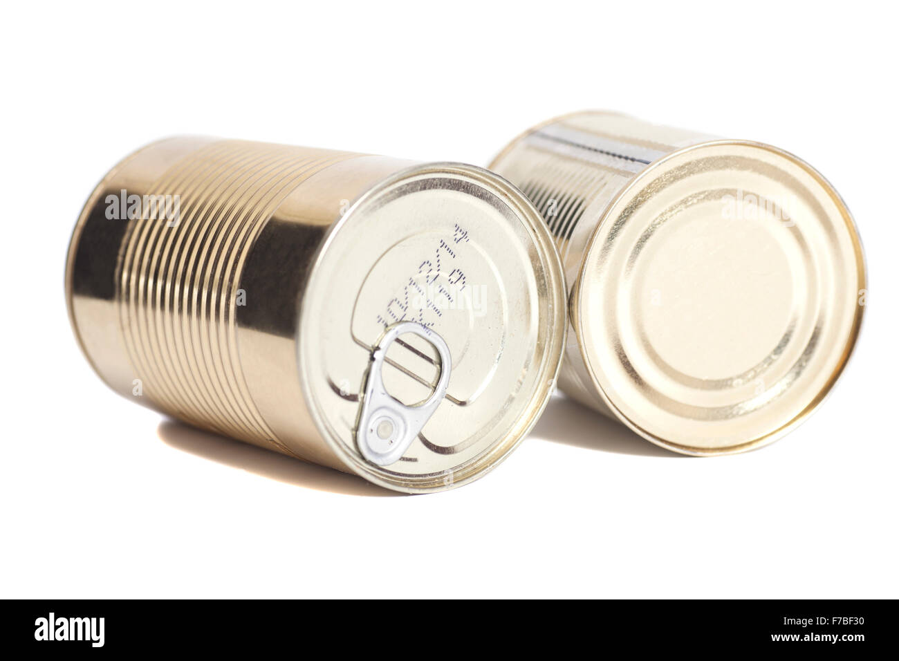sealed metal cans isolated on white background Stock Photo - Alamy