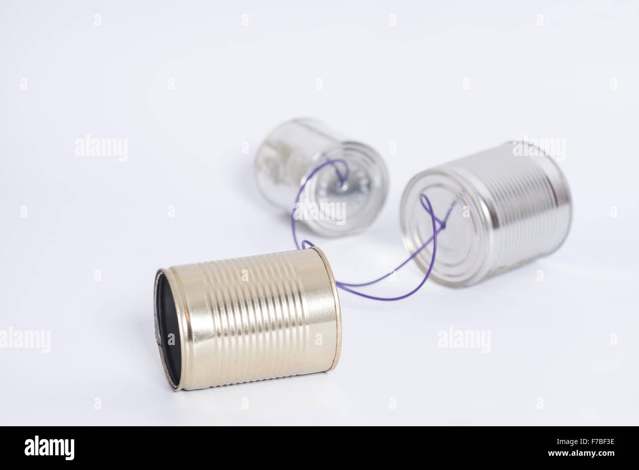 Tin can phone.Telecommunication concept Stock Photo - Alamy