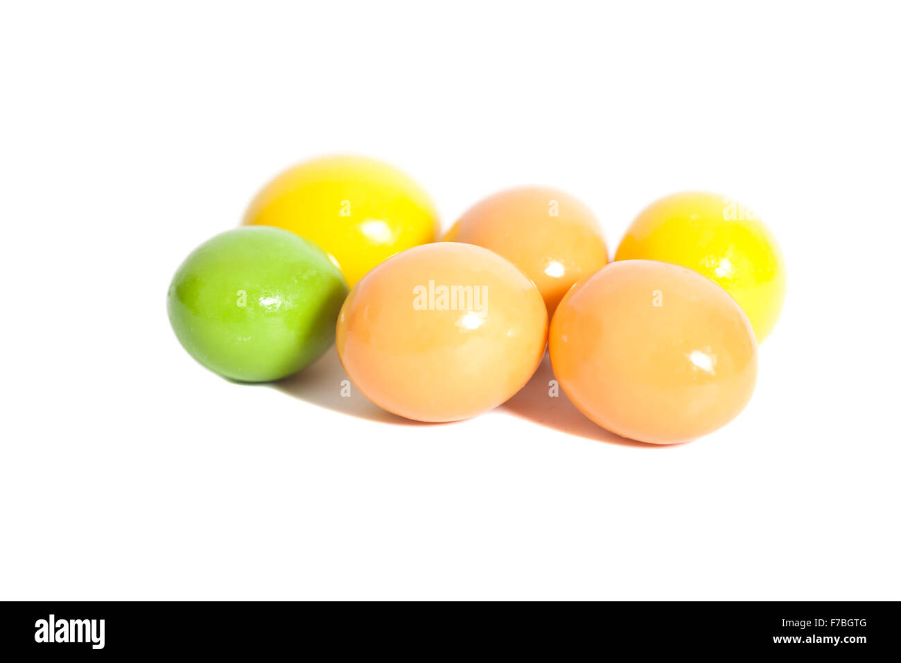 small round candies isolated on white Stock Photo - Alamy