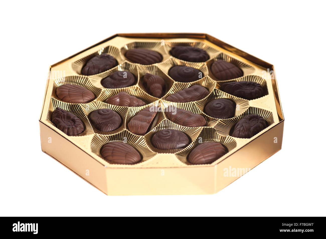 Golden Box of chocolate candies isolated on white Stock Photo - Alamy