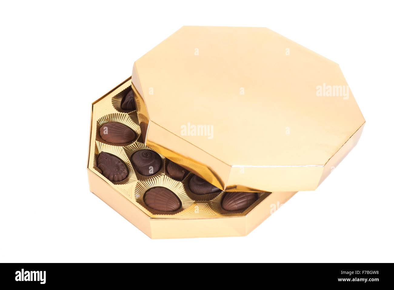 Golden Box of chocolate candies isolated on white Stock Photo - Alamy