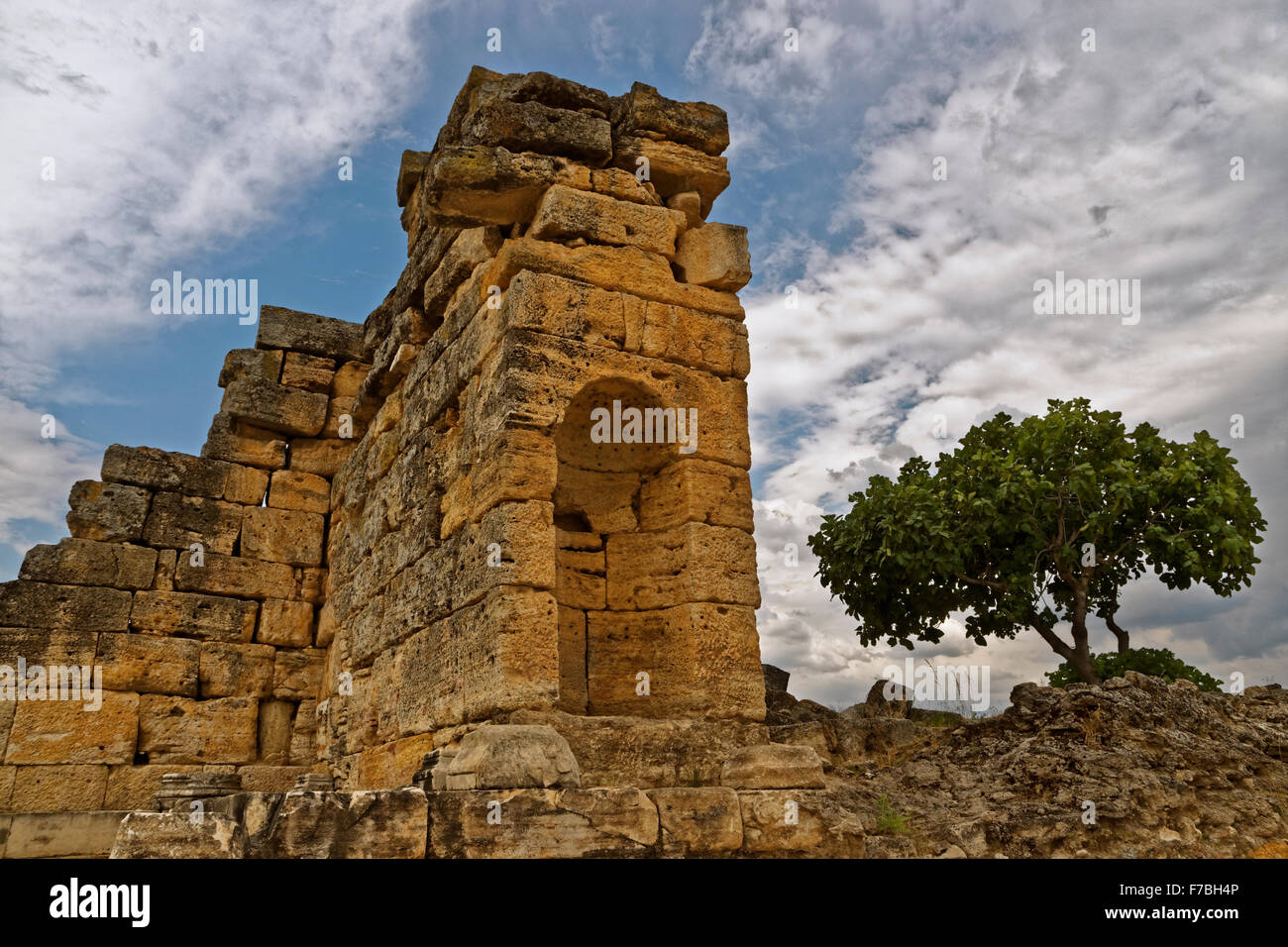 Remains at the ancient Roman settlement of Hierapolis above Pamukkale ...