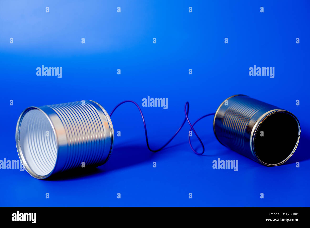 tin can phone.communication concept Stock Photo - Alamy
