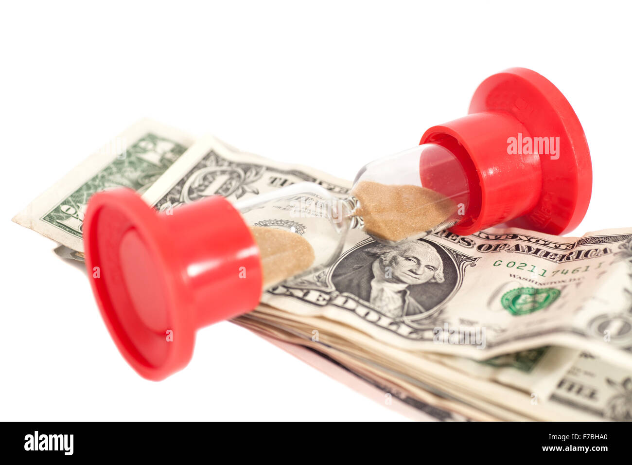Hourglass with Dollars isolated on white Stock Photo - Alamy