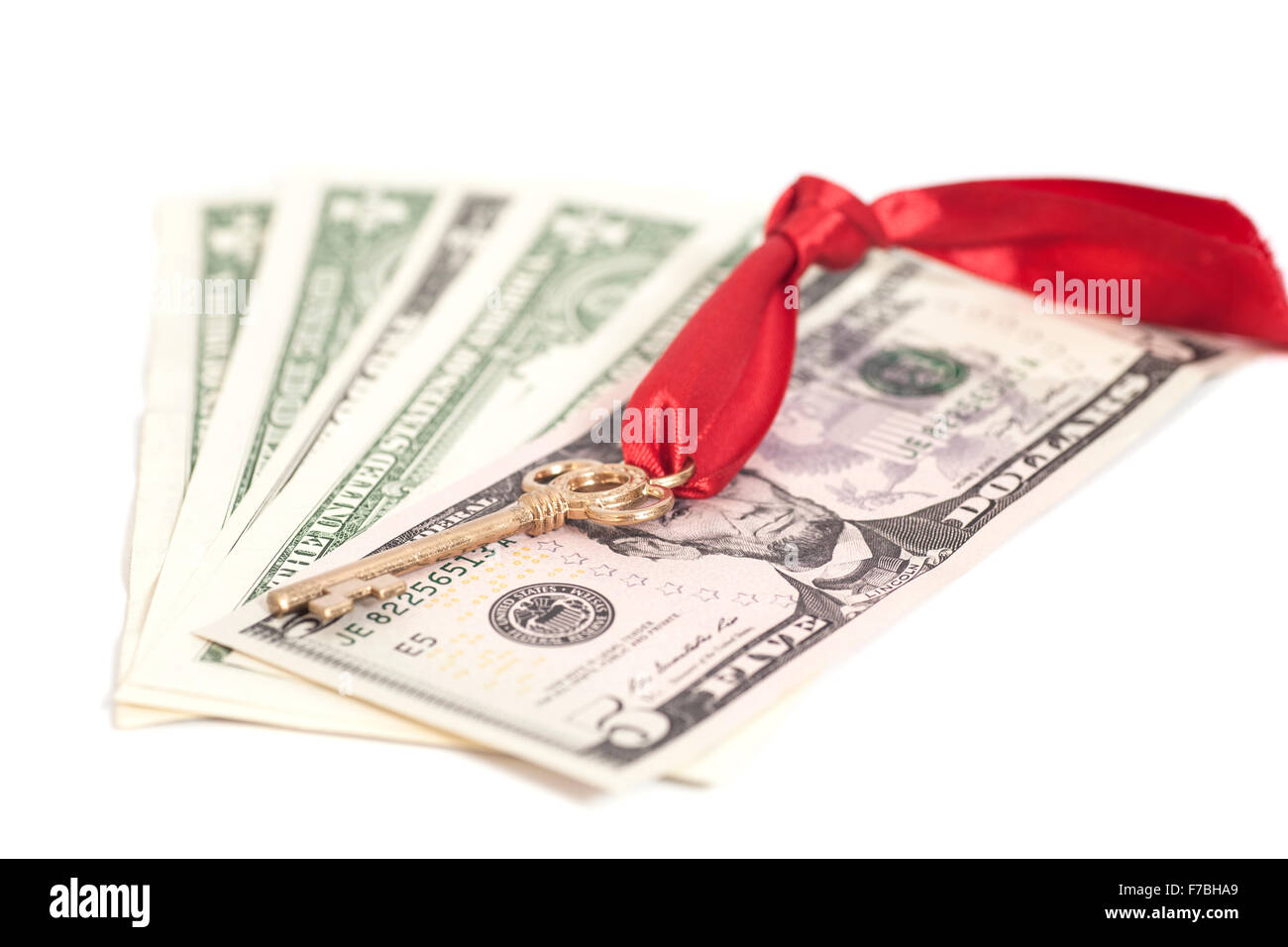 Key to success on dollar banknotes isolated Stock Photo - Alamy