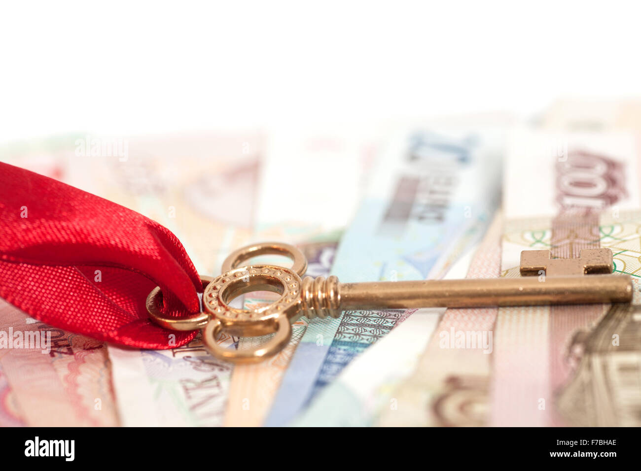 Key to success On International Money isolated Stock Photo - Alamy