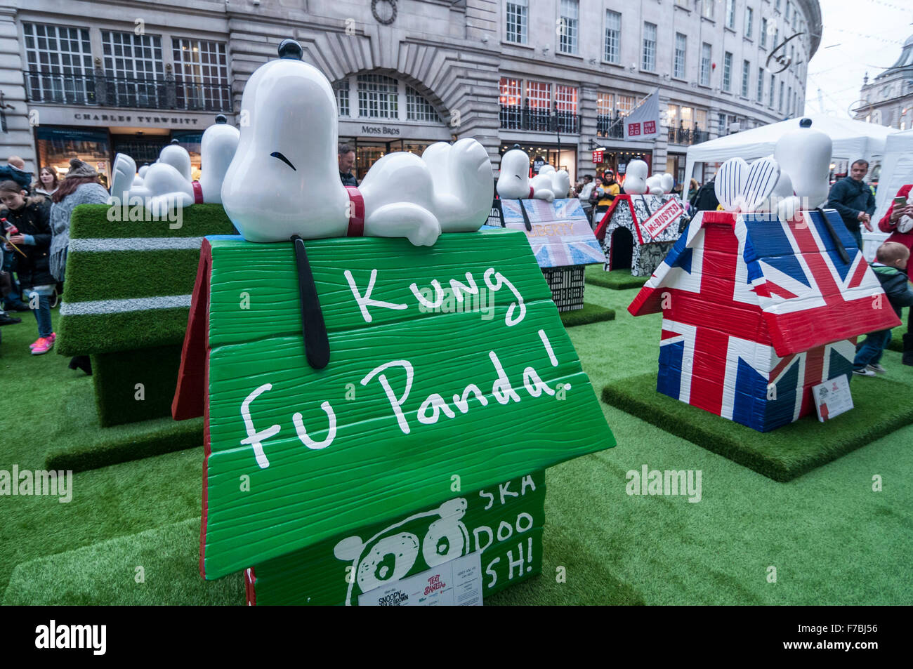 London, UK. 28 November 2015. A display of painted Snoopy kennels on ...