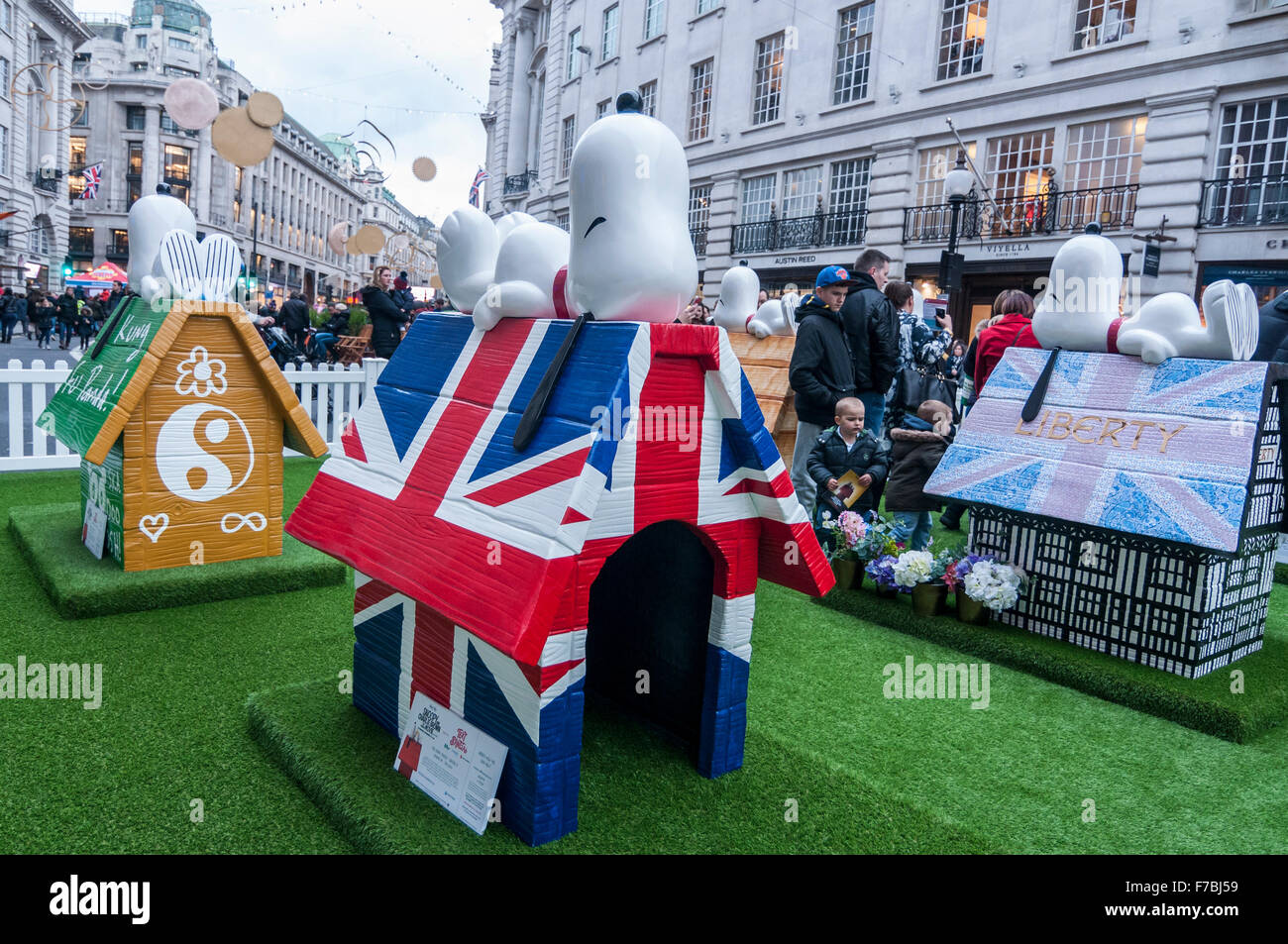 London, UK. 28 November 2015. A display of painted Snoopy kennels on ...