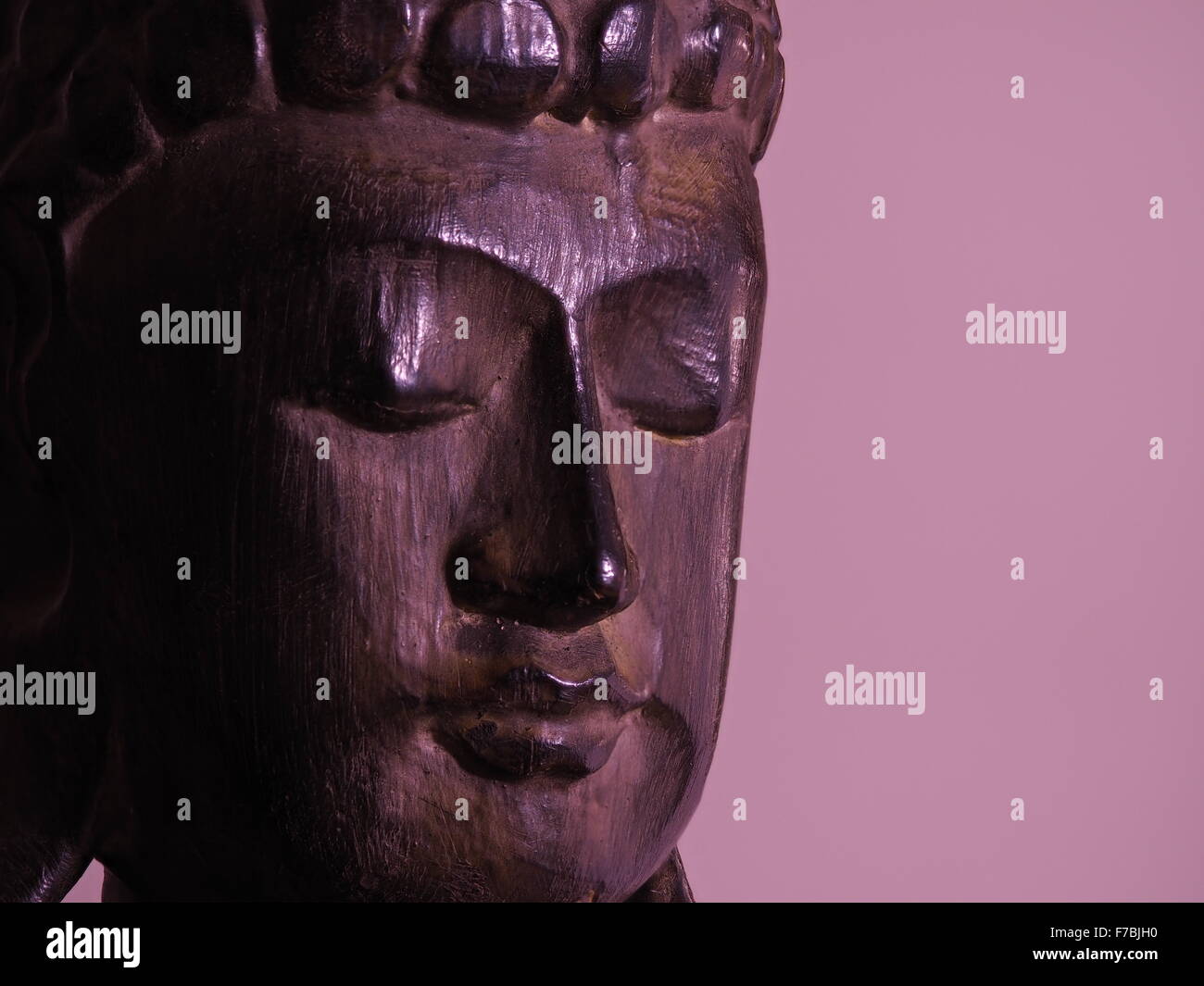 Buddha face closeup Stock Photo - Alamy