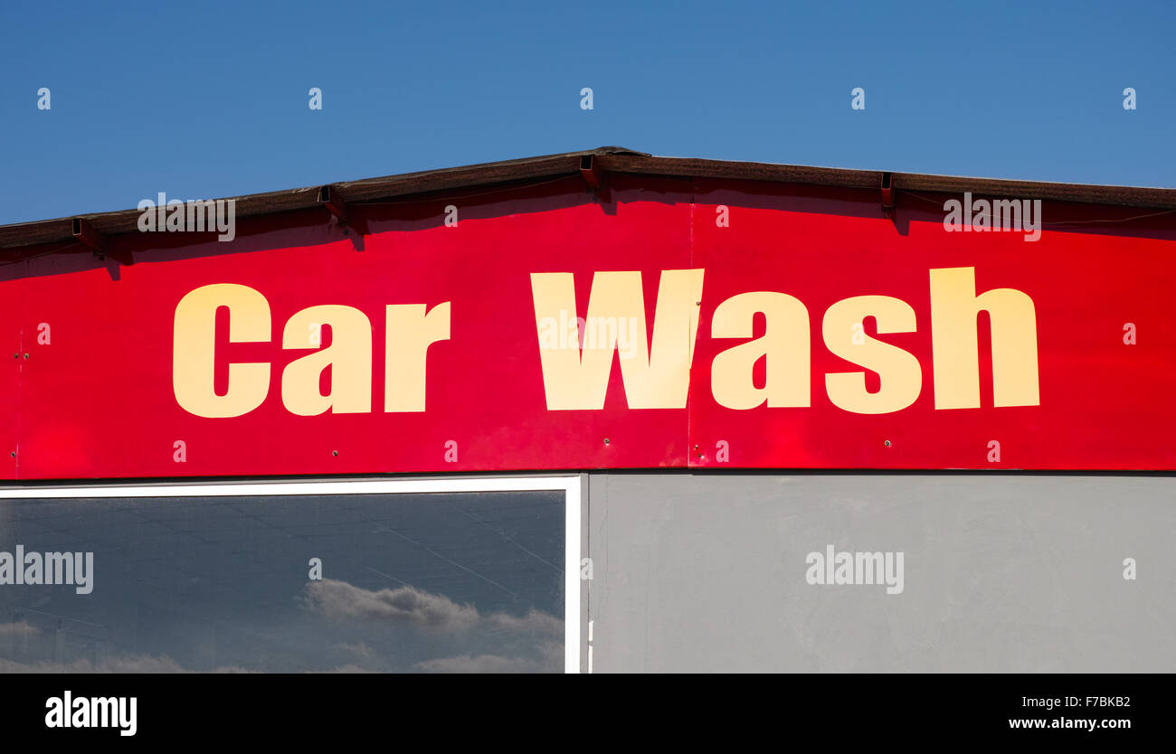 Words Car Wash on building Stock Photo - Alamy