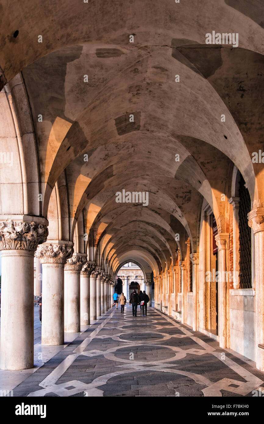 Venice, Italy Palazzo Ducale columned Arcade, Doges Palace walkway in ...