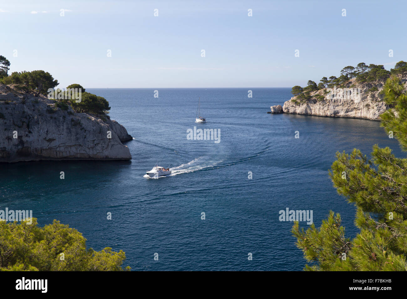 Boat on the blue sea of Calanques, France Stock Photo - Alamy