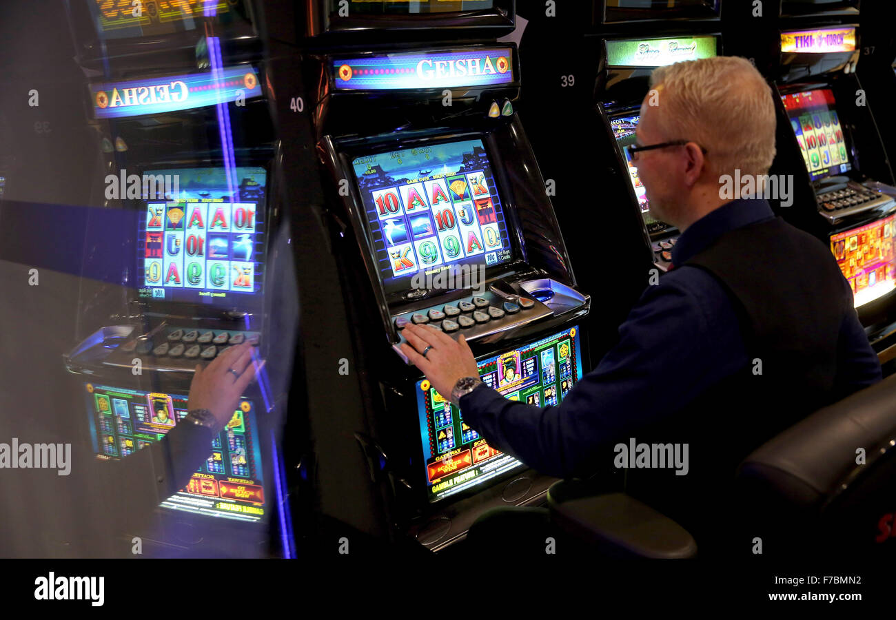 Chemnitz, Germany. 27th Nov, 2015. A man sits in front of a gaming ...