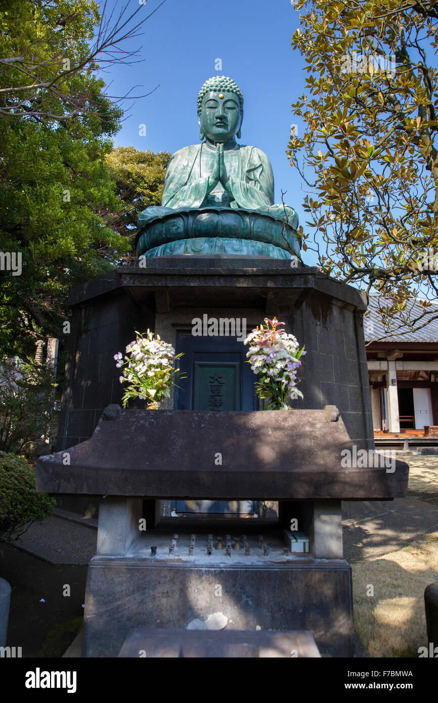 A statue of a Buddha in Tokyo Japan Stock Photo - Alamy