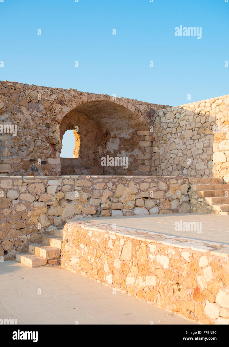Ancient stone fortification with windows and ladder Stock Photo - Alamy