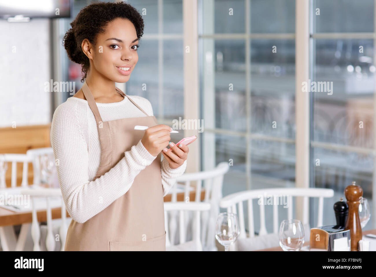Waitress is ready to take order Stock Photo - Alamy