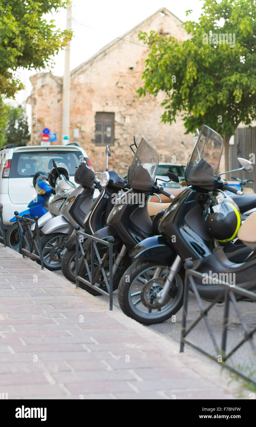 Group of motorbikes parked on street hi-res stock photography and ...