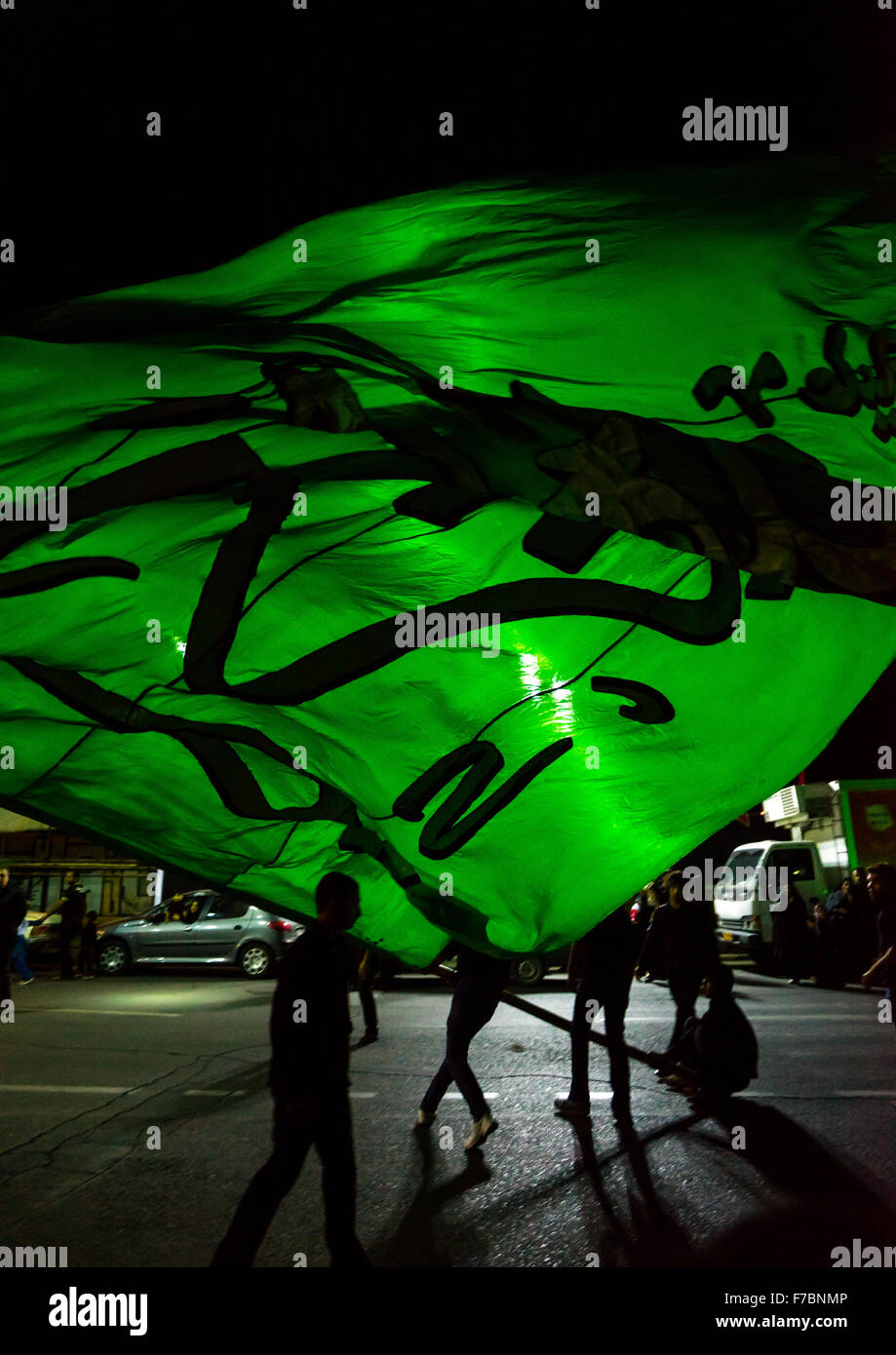 Iranian Shiite Muslims Men Parading With Green Flag During Ashura, The ...