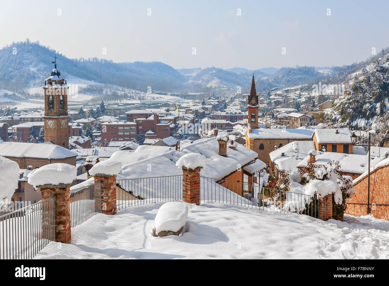 View on small italian town covered with snow in Piedmont, Northern ...
