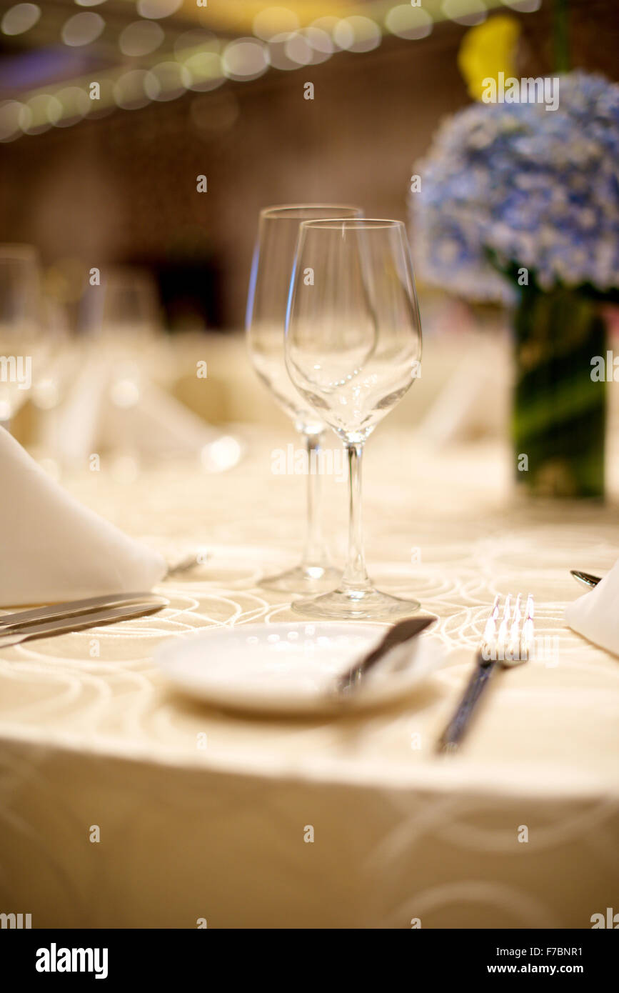 Wedding table set up with wine glasses Stock Photo - Alamy