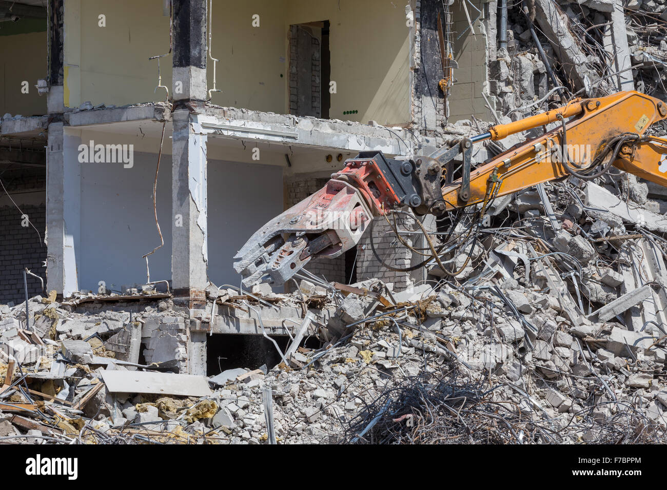 Pieces of Metal and Stone are Crumbling from Demolished Stock Photo - Alamy